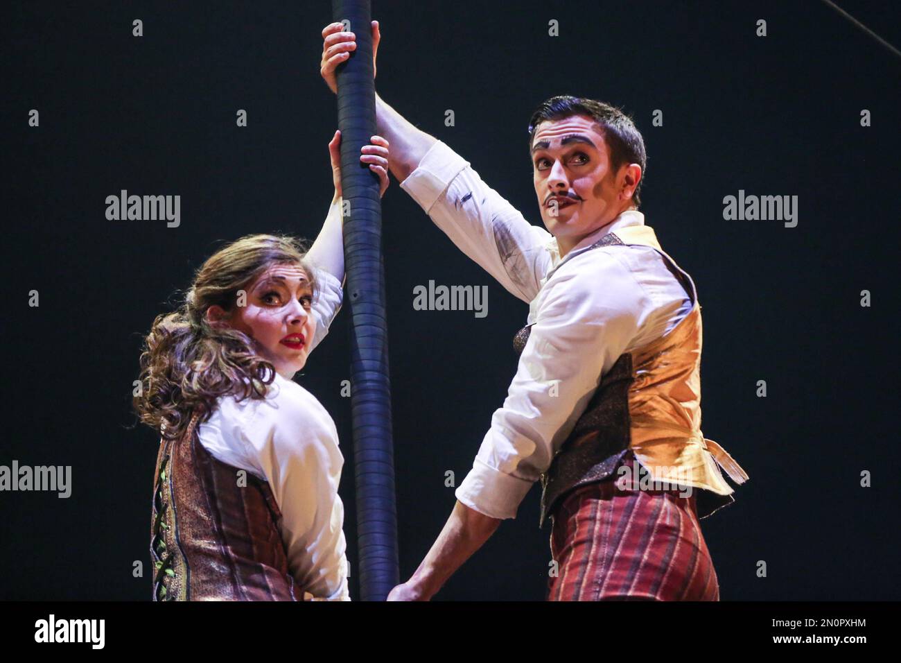 Cast members from Cirque du Soleil perform on stage during the LA ...