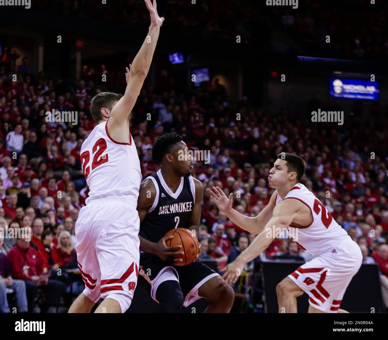 Wisconsin's Ethan Happ (22) and Bronson Koenig, right, trap Milwaukee's ...