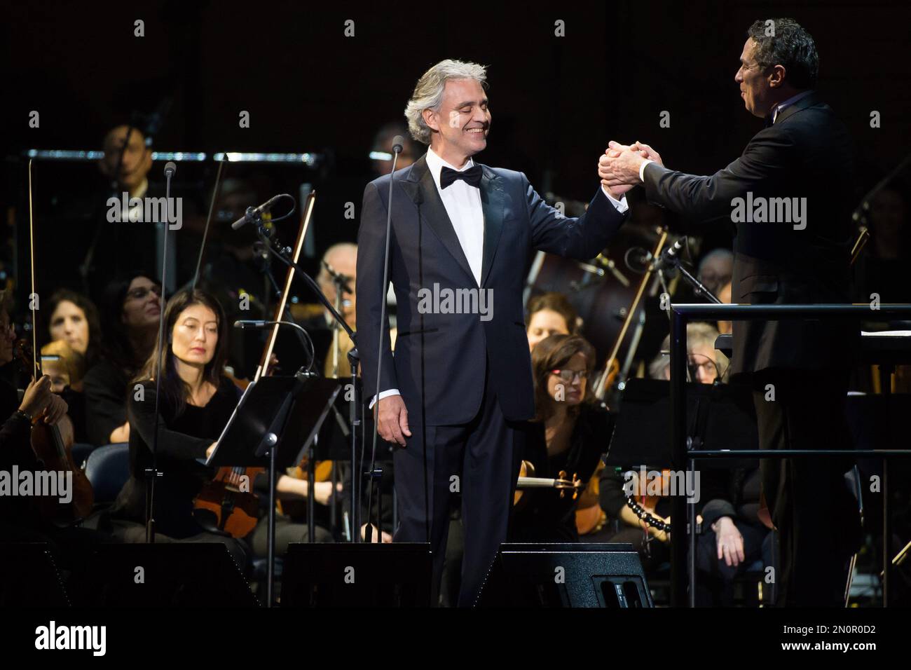 Andrea Bocelli, left, and conductor Eugene Kohn perform in concert to ...