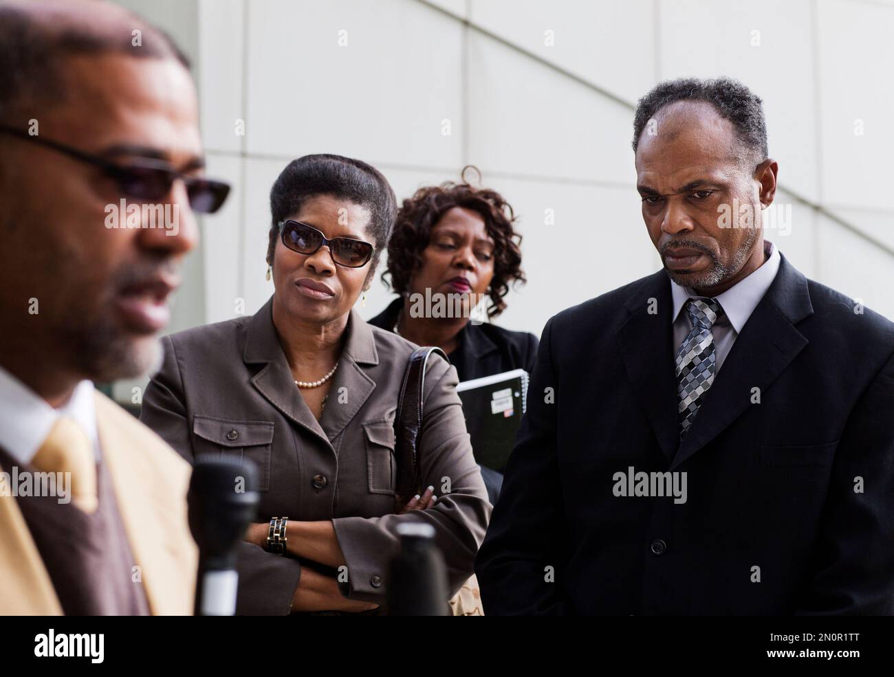 Daniel Dixon, right, and his sister Deborah Dixon, left, watch as ...