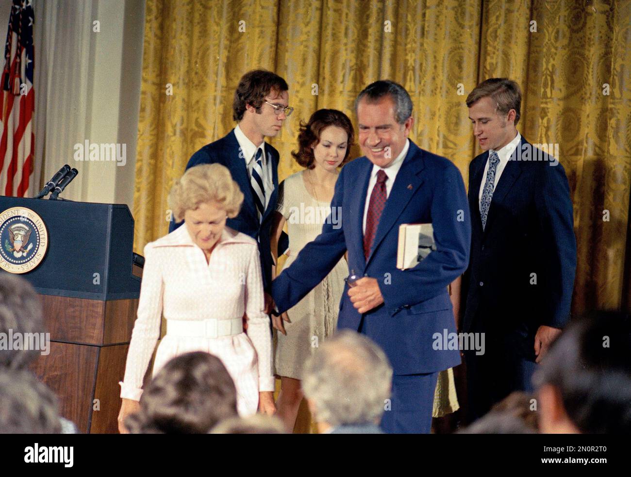 President Richard M. Nixon and his family leave the podium following ...
