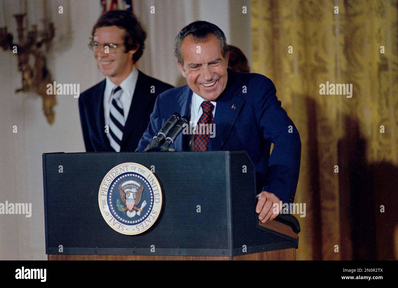 President Richard M. Nixon laughs during an emotional farewell speech ...