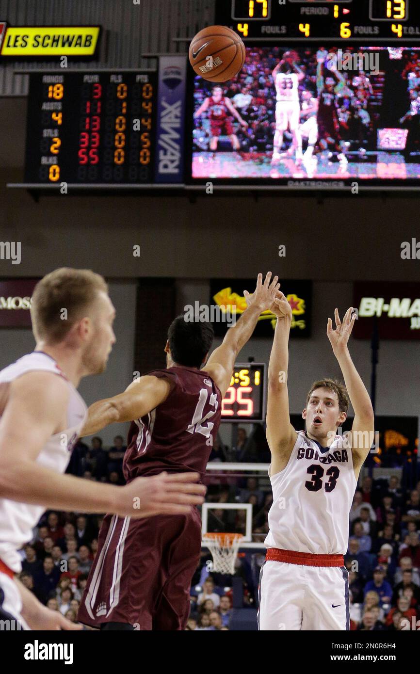 Gonzaga's Kyle Wiltjer (33) shoots against Montana's Martin Breunig (12 ...