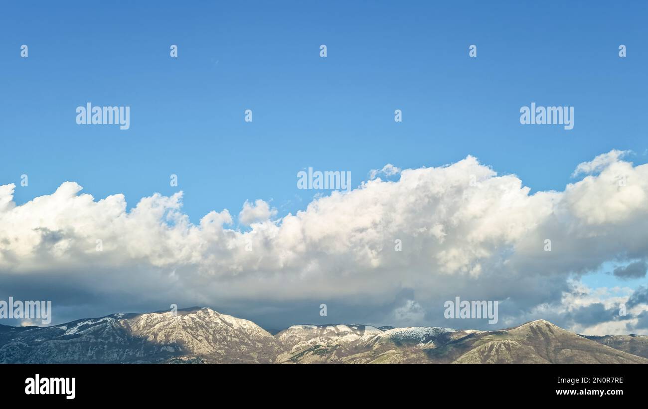 Timelapse cloudy sky mountains nature hi-res stock photography and ...