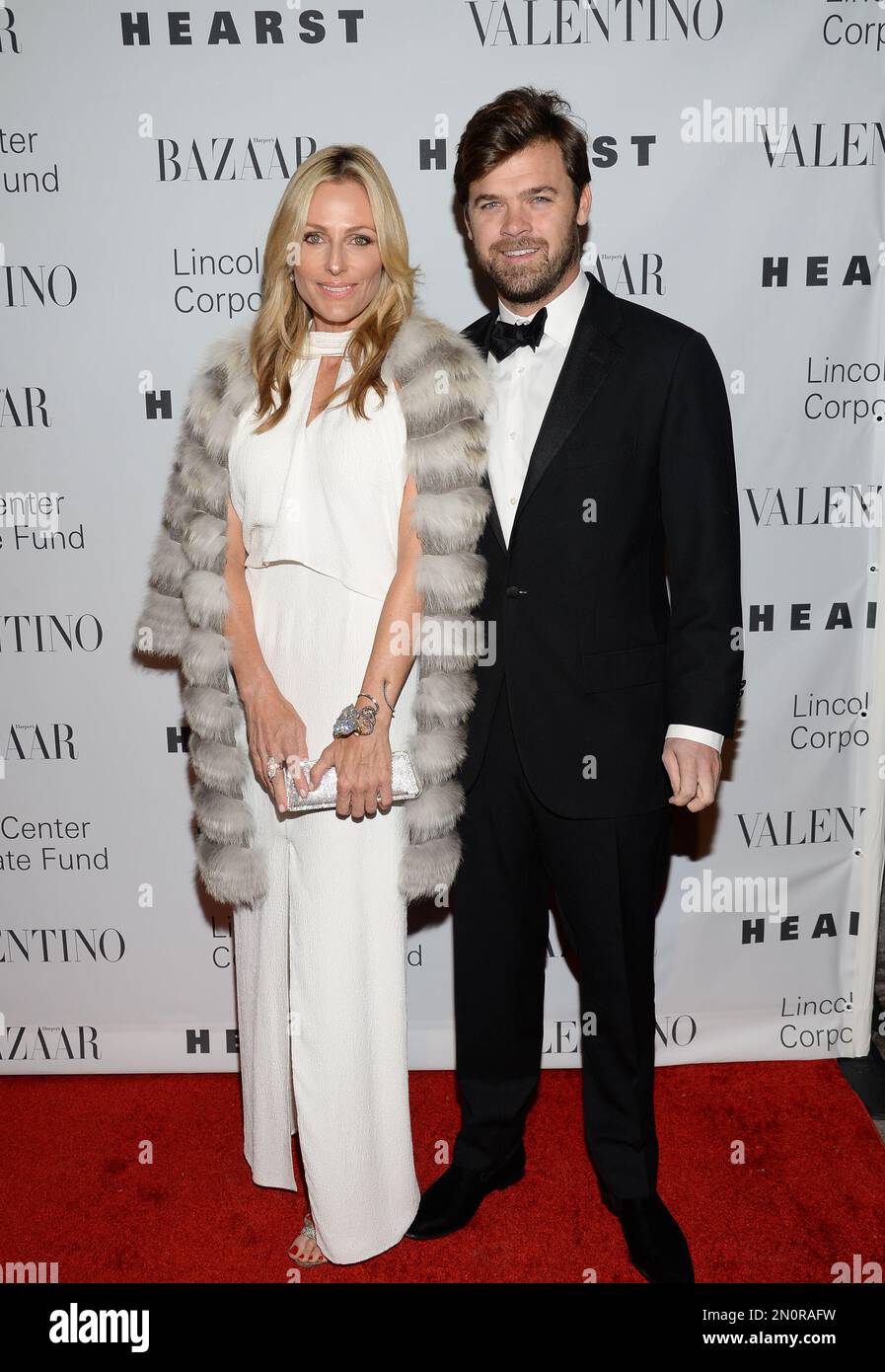 Jamie Tisch, left, and guest attend "An Evening Honoring Valentino ...