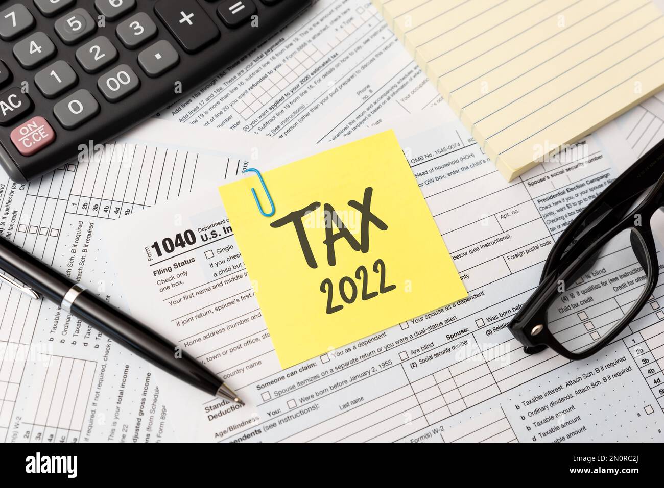 Tax form and calculator hi-res stock photography and images - Alamy