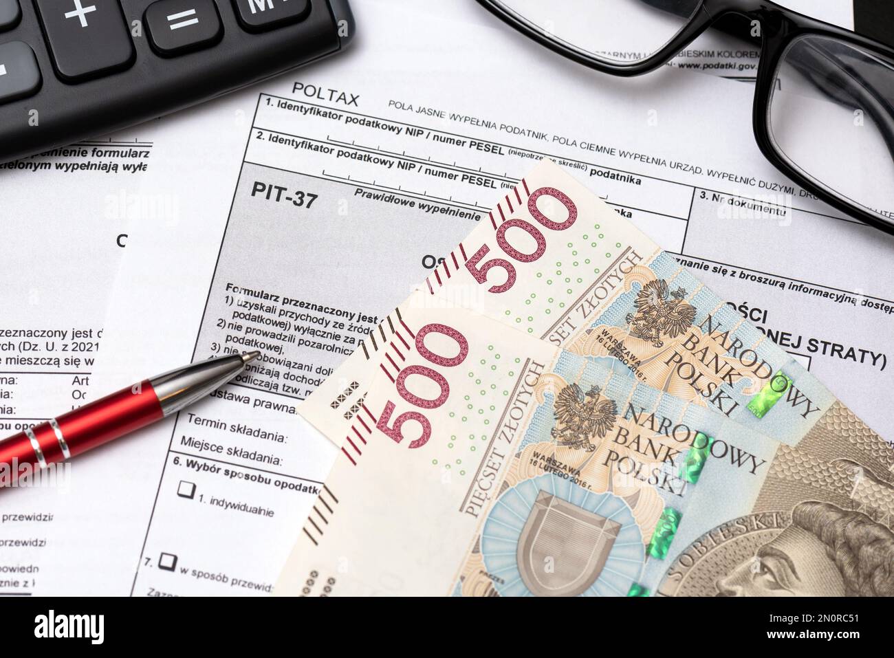 Polish tax form, polish banknotes. Tax income with polish tax forms and ...