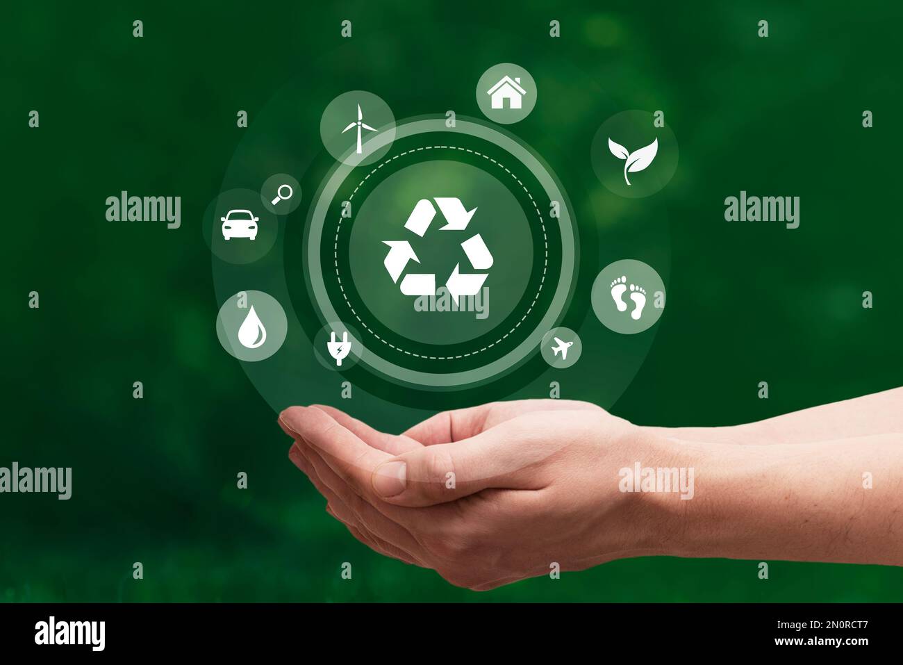 Hand with recycling and eco symbols. Sustainable energy sources, zero ...