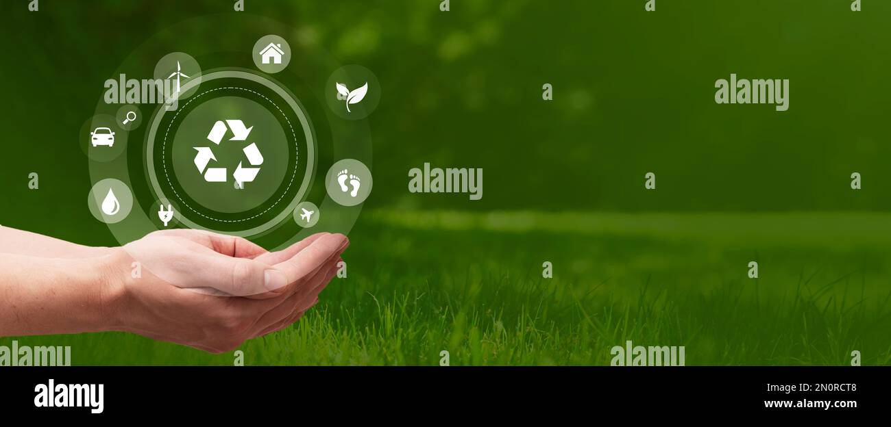Hand with recycling and eco symbols. Sustainable energy sources, zero ...