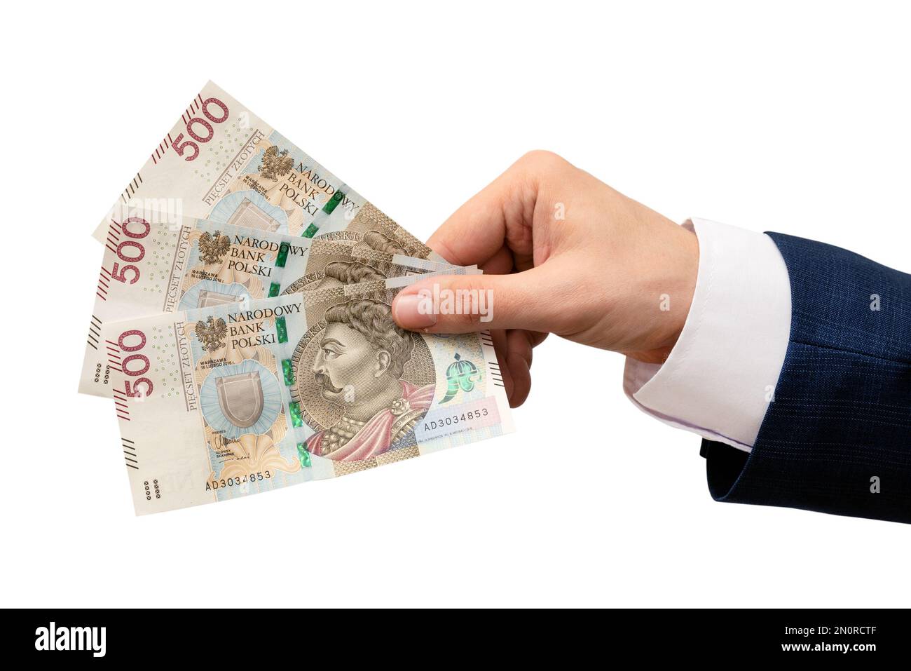 Hand holding polish zloty banknote hi-res stock photography and images ...