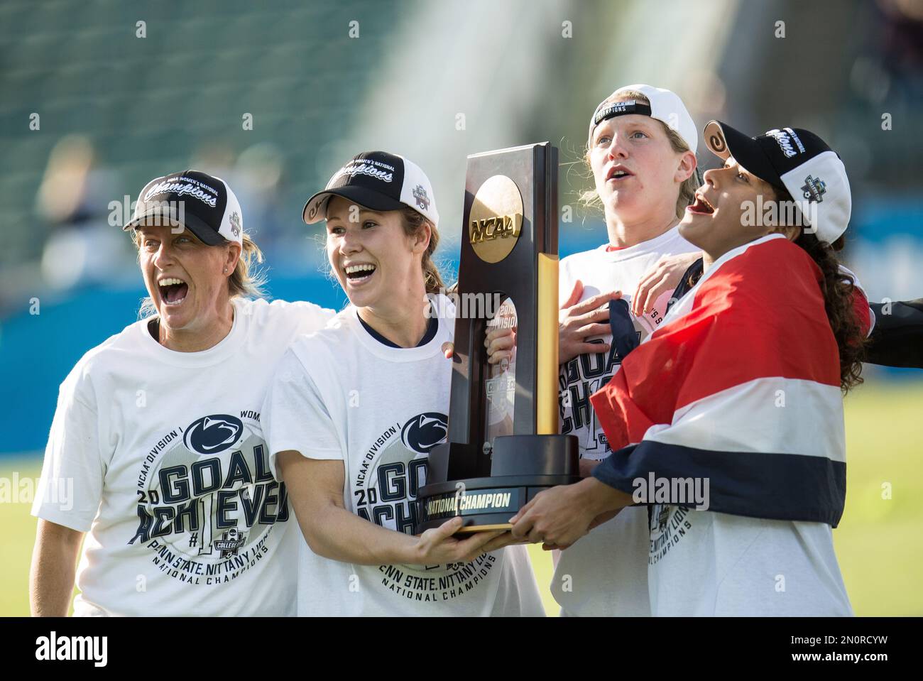 Penn State head women's soccer coach Erica Walsh, left, and players ...