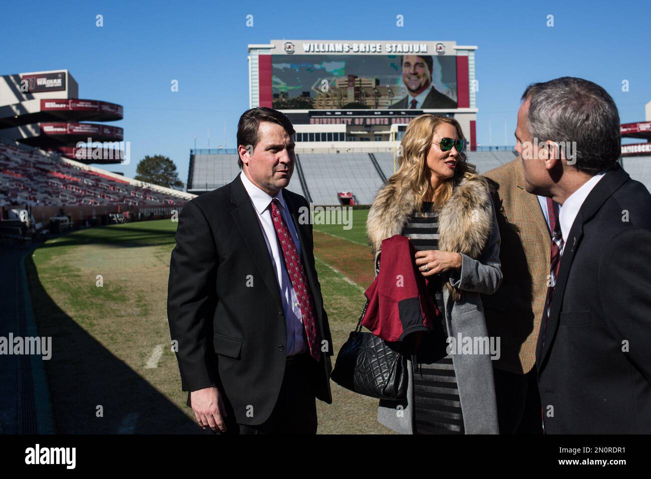 New South Carolina NCAA college head football coach Will Muschamp, left ...