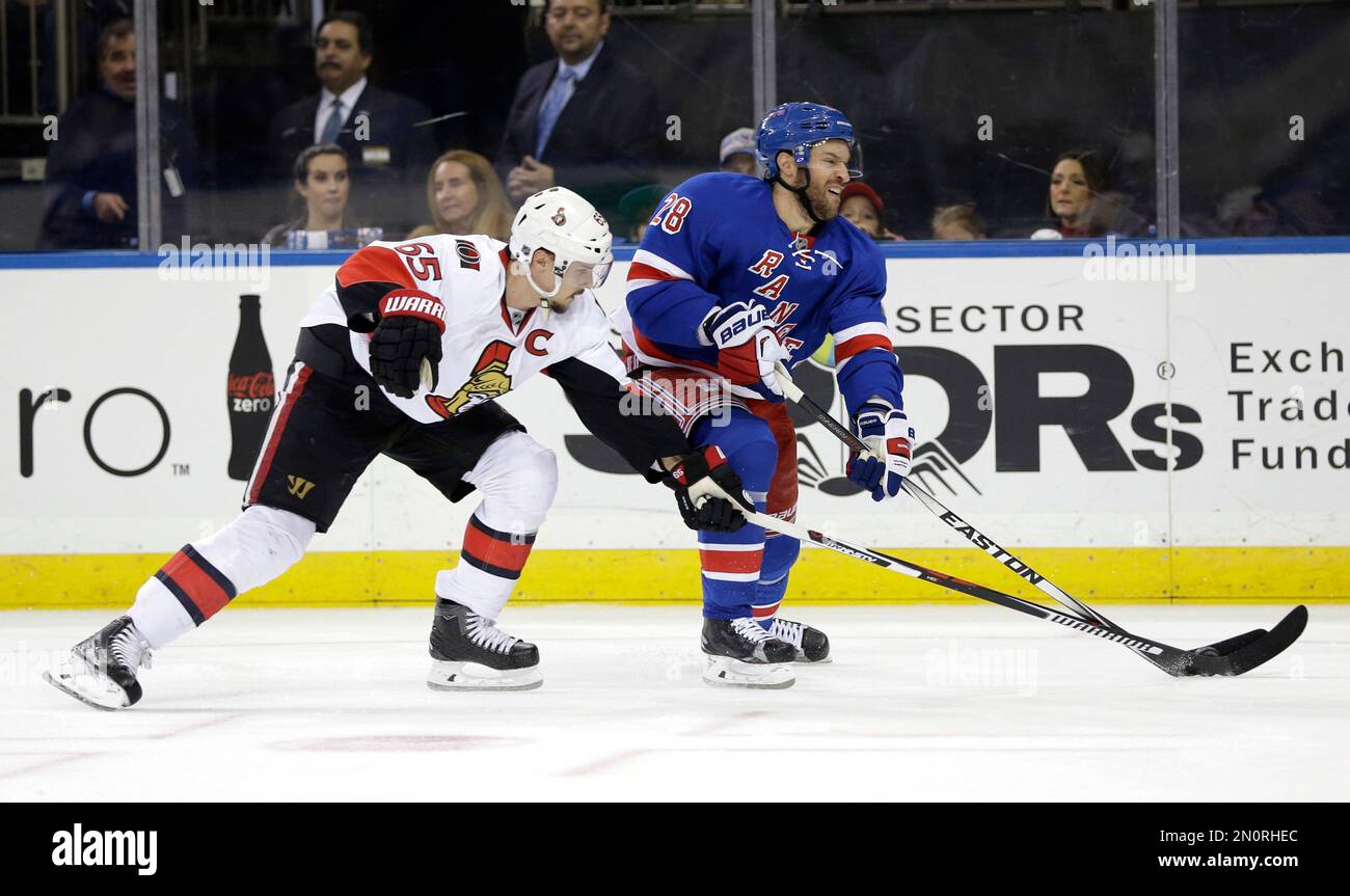 Ottawa Senators' Erik Karlsson, left, and New York Rangers' Dominic ...