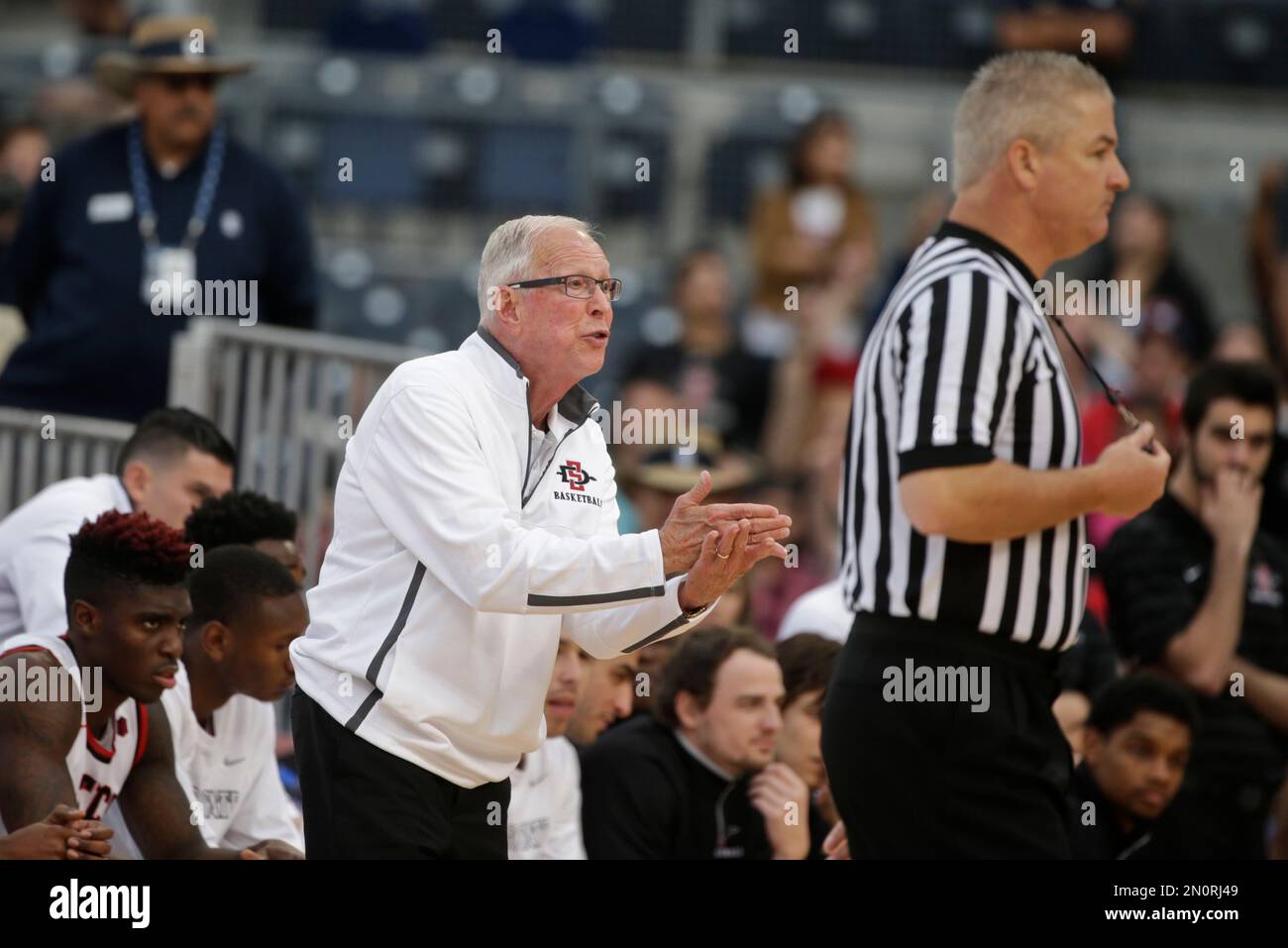 San Diego State head coach Steve Fisher is animated trying to rally his ...