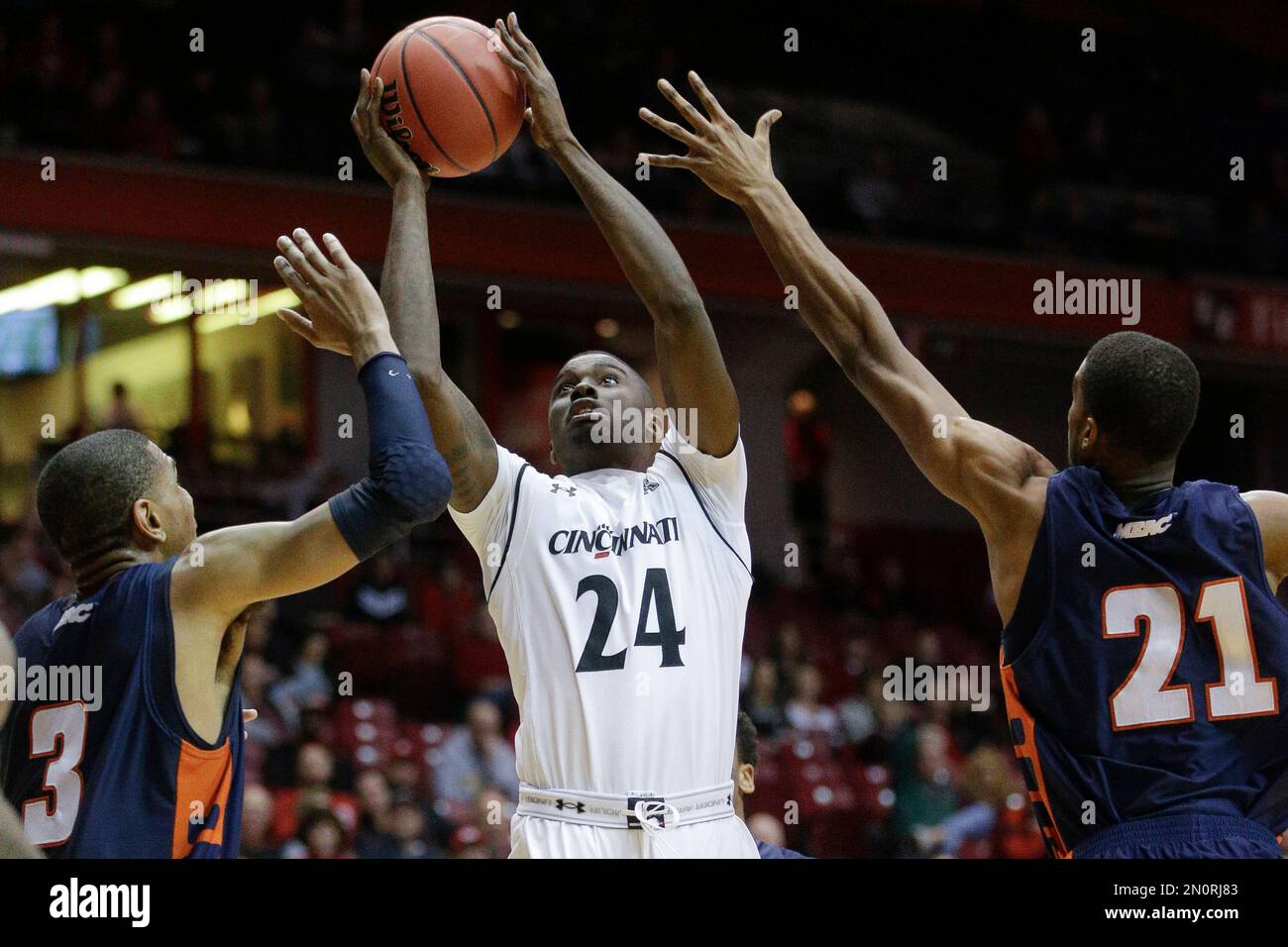 Cincinnati's Shaq Thomas (24) shoots against Morgan States's Rasean ...