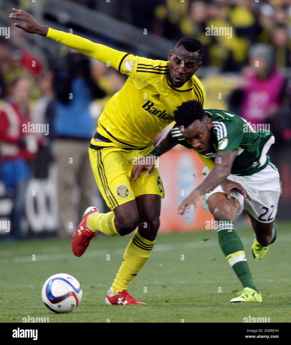 Columbus Crew midfielder Tony Tchani, left, of Cameroon, and Portland ...