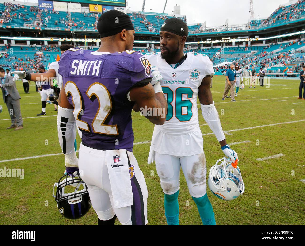 Baltimore Ravens cornerback Jimmy Smith (22) greets Miami Dolphins ...
