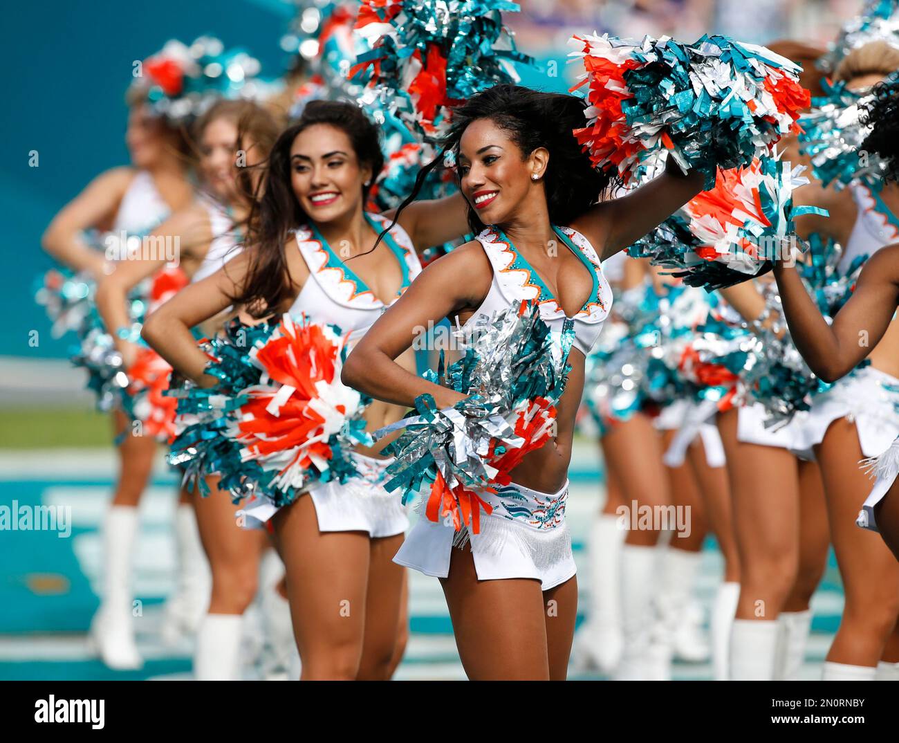Miami cheerleaders perform during the first half of an NFL football gam ...