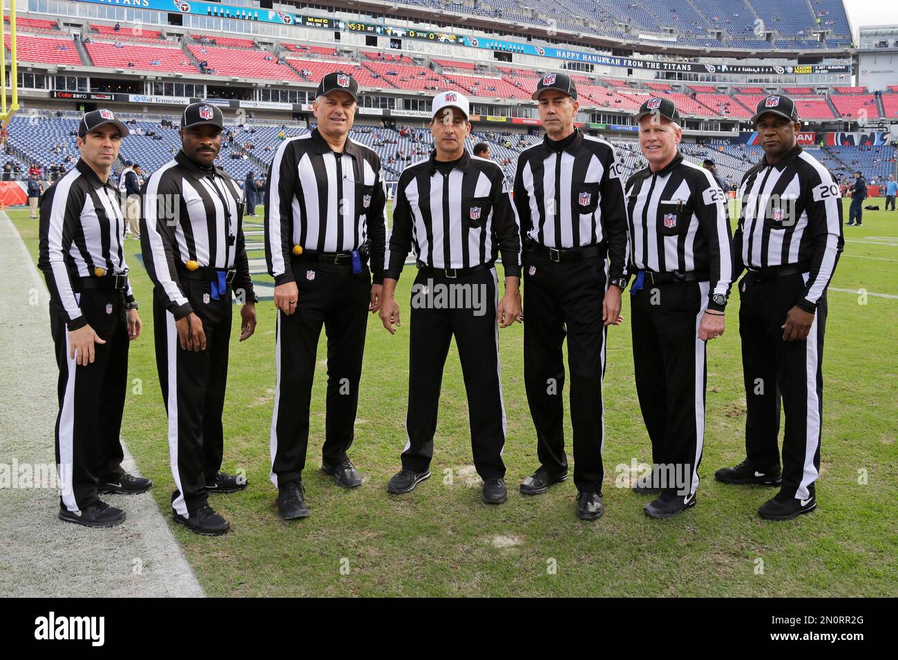 The officials for an NFL football game between the Tennessee Titans and ...