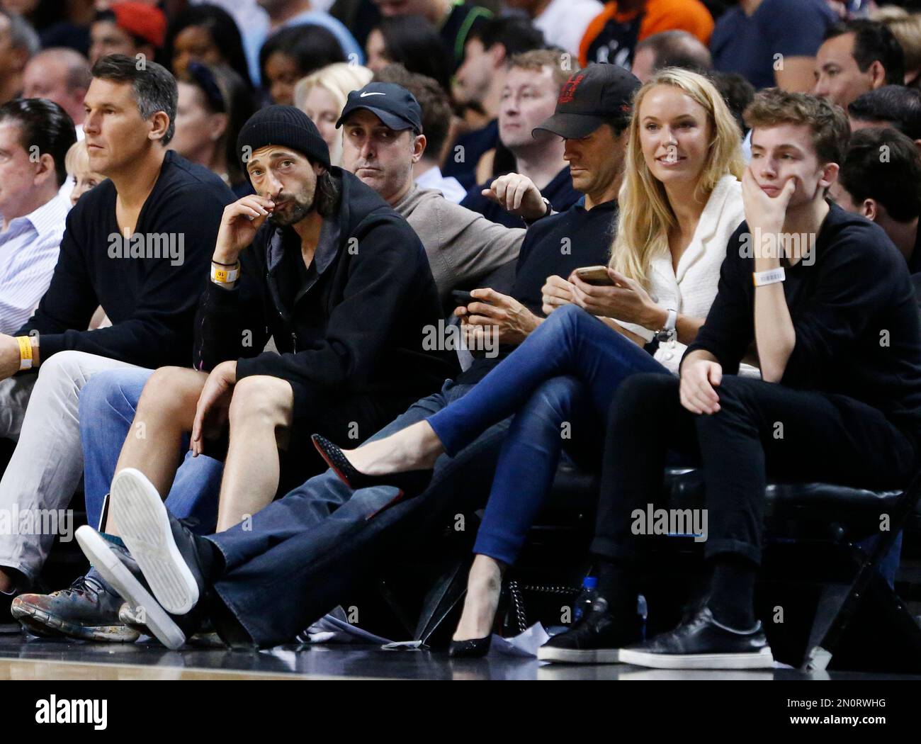 Actor Adrien Brody, second from left, and Danish tennis player Caroline ...