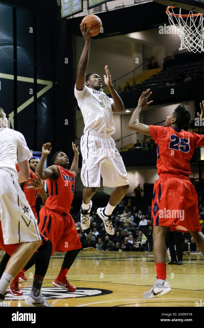 Vanderbilt center Damian Jones (30) shoots over the reach of Detroit ...