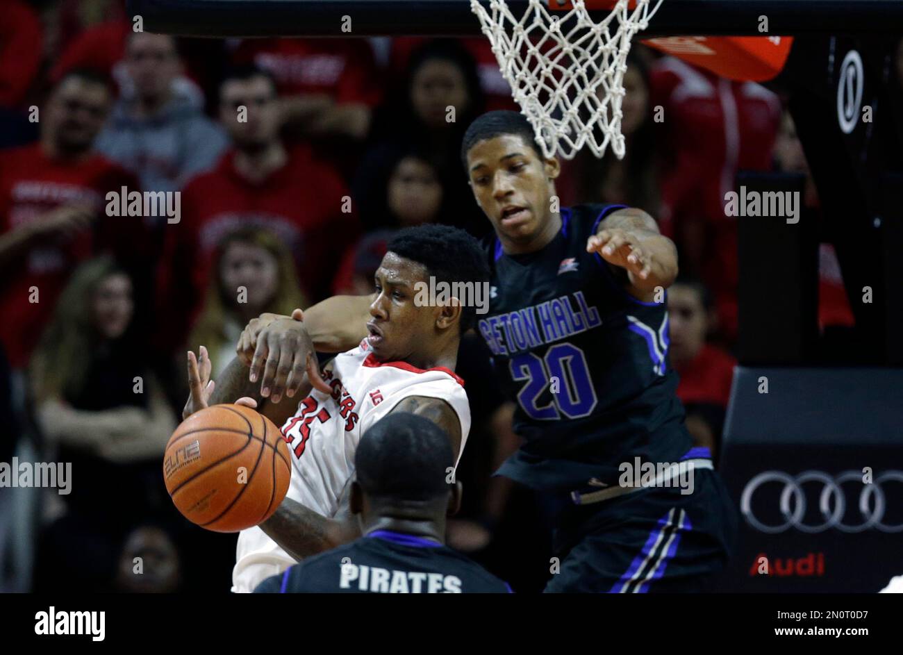 Rutgers forward Greg Lewis (35) grabs a loose ball in front of Seton ...