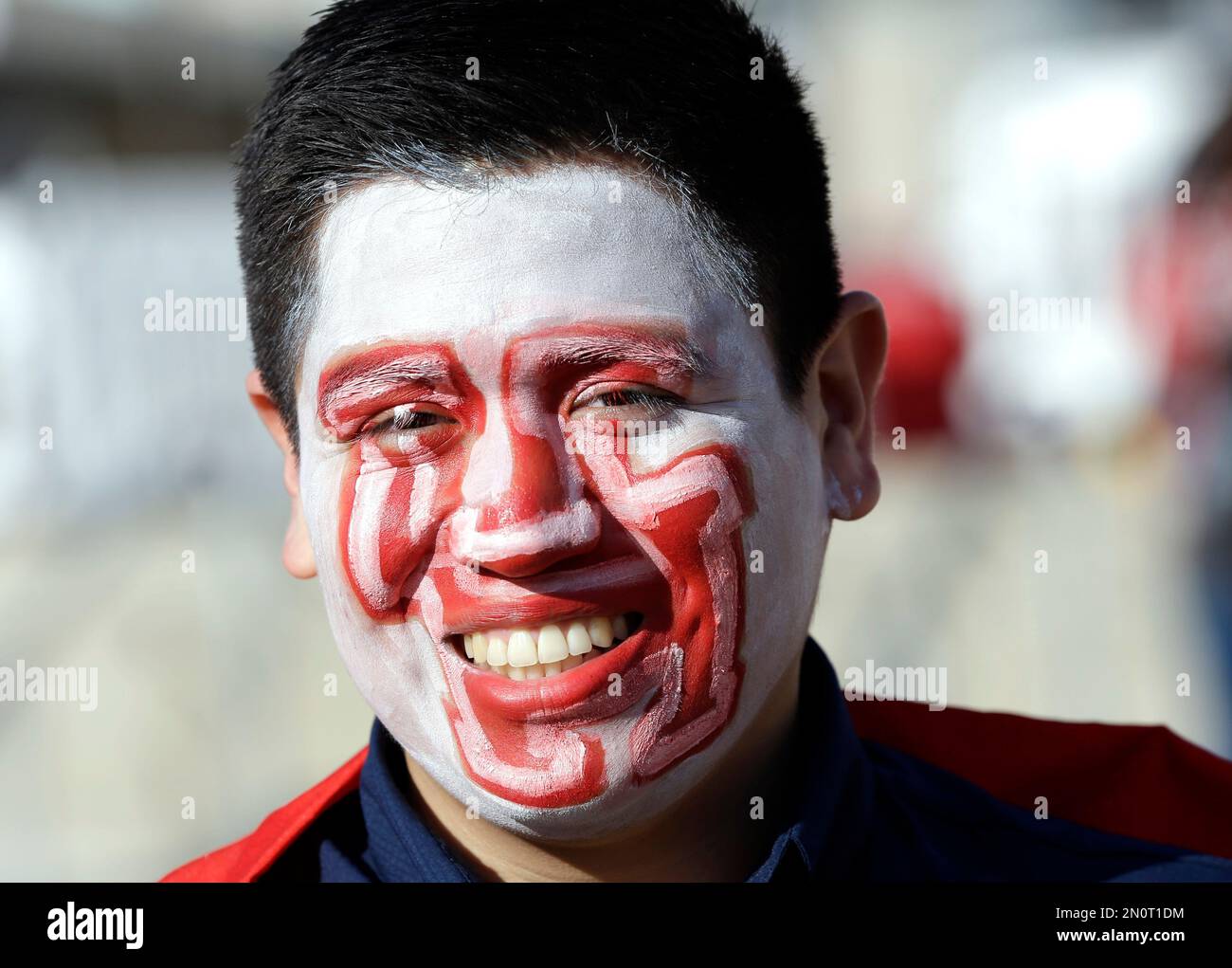 University of Houston alumni Jesus Reyes shows his school spirit before ...