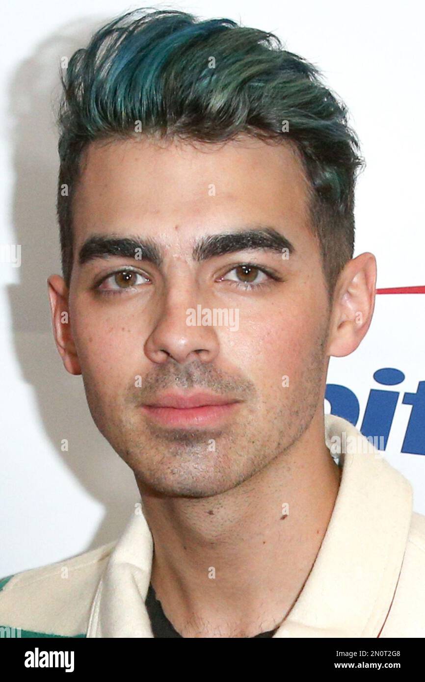 Joe Jonas arrives at 102.7 KIIS FM's iHeartRadio Jingle Ball at Staples ...