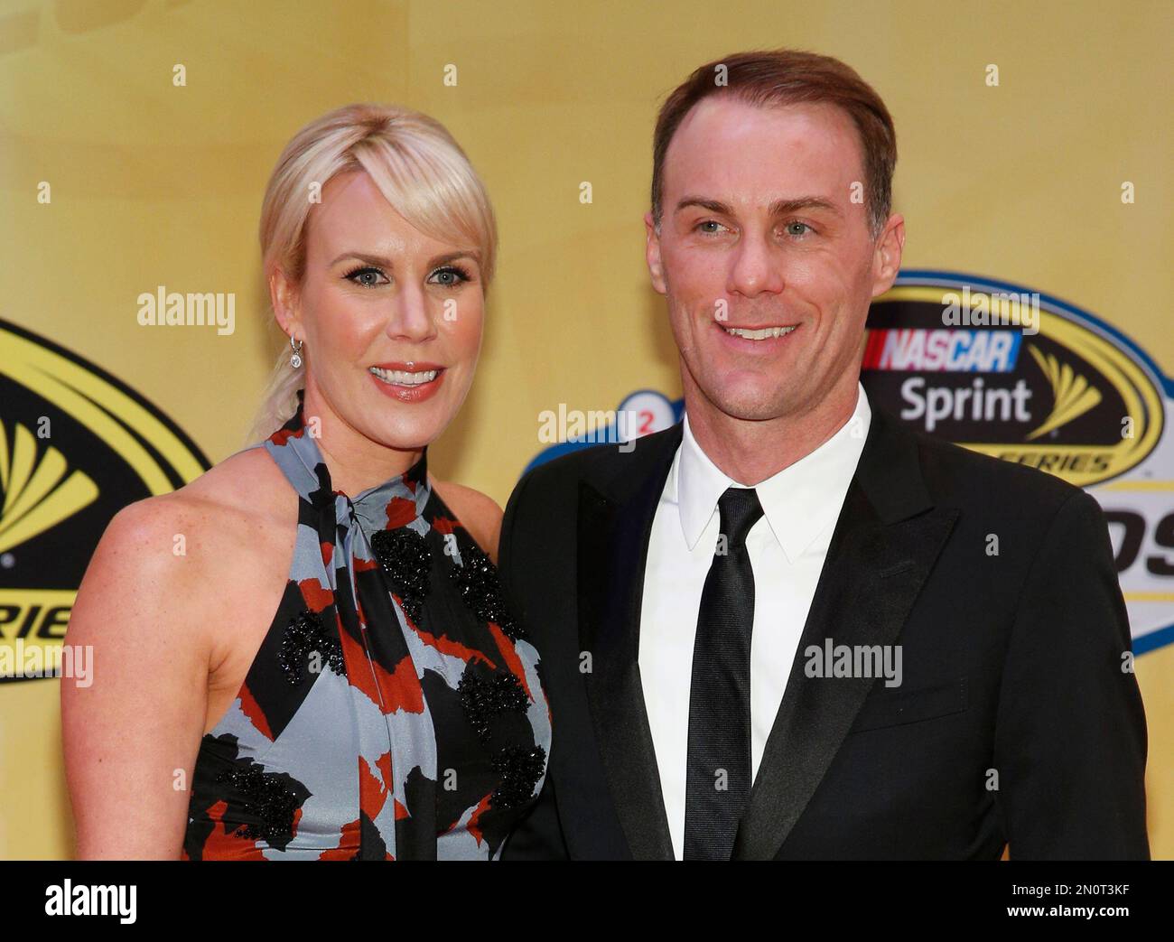 Kevin Harvick and his wife, DeLana, pose on the red carpet before the ...