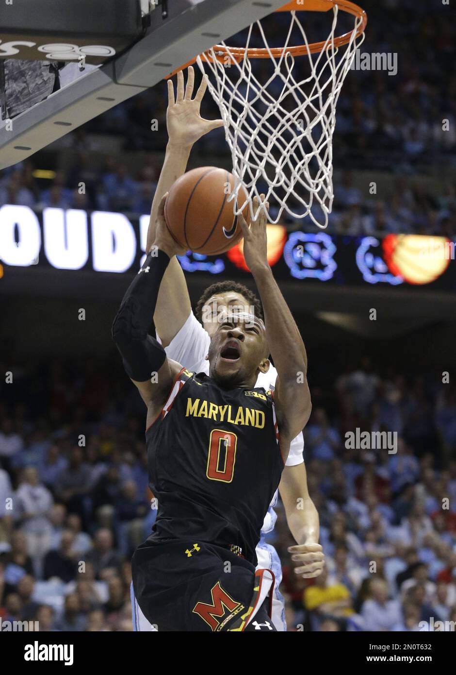 North Carolina's Justin Jackson, rear, defends as Maryland's Rasheed ...