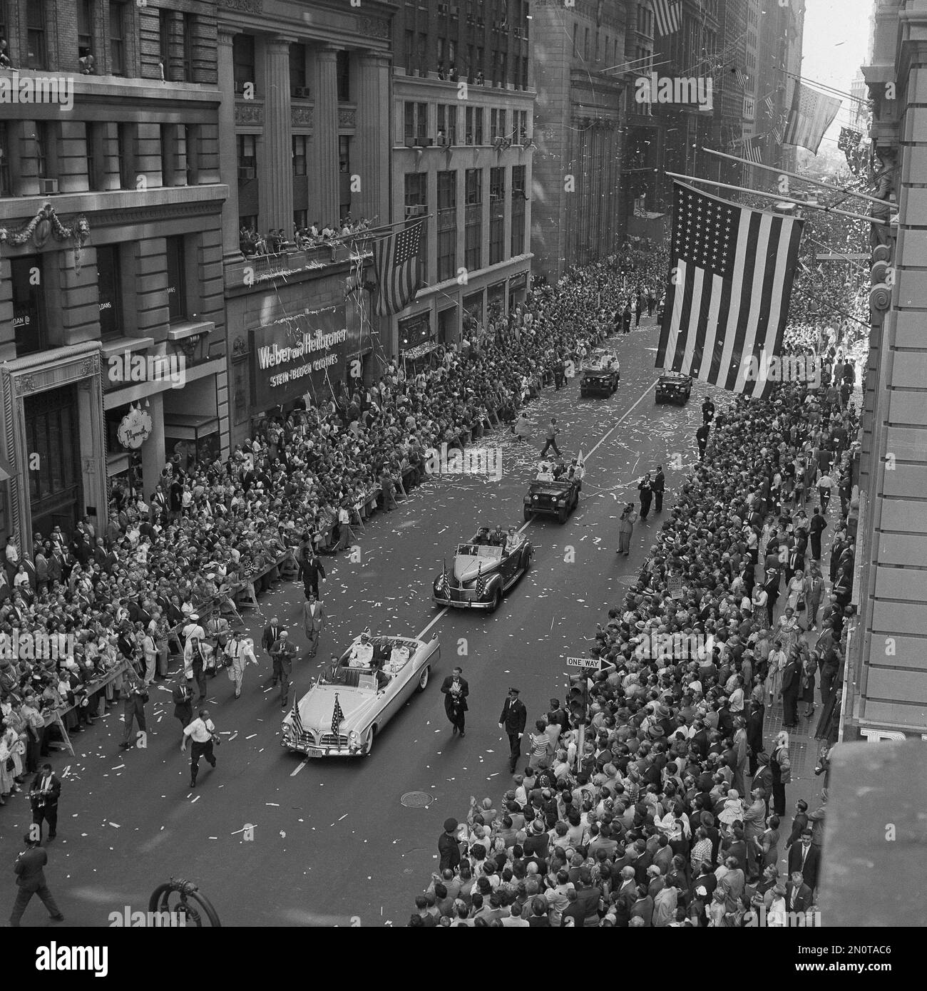 The crew of the nuclear-powered USS Nautilus rides up Lower Broadway in ...