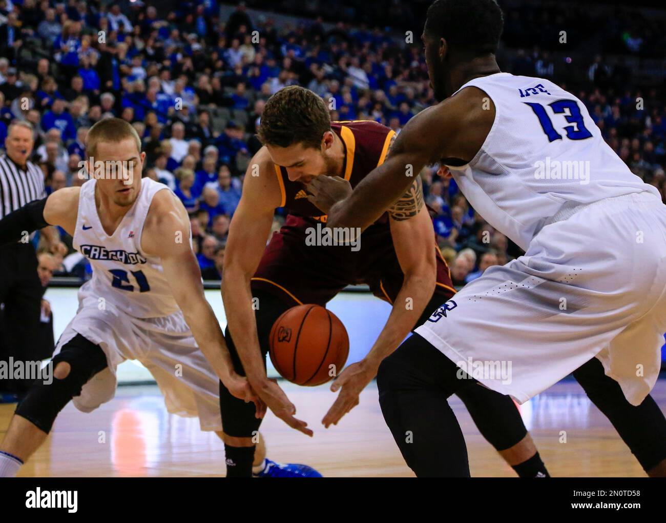 Creighton's Isaiah Zierden (21), Cole Huff (13) and Arizona State's ...