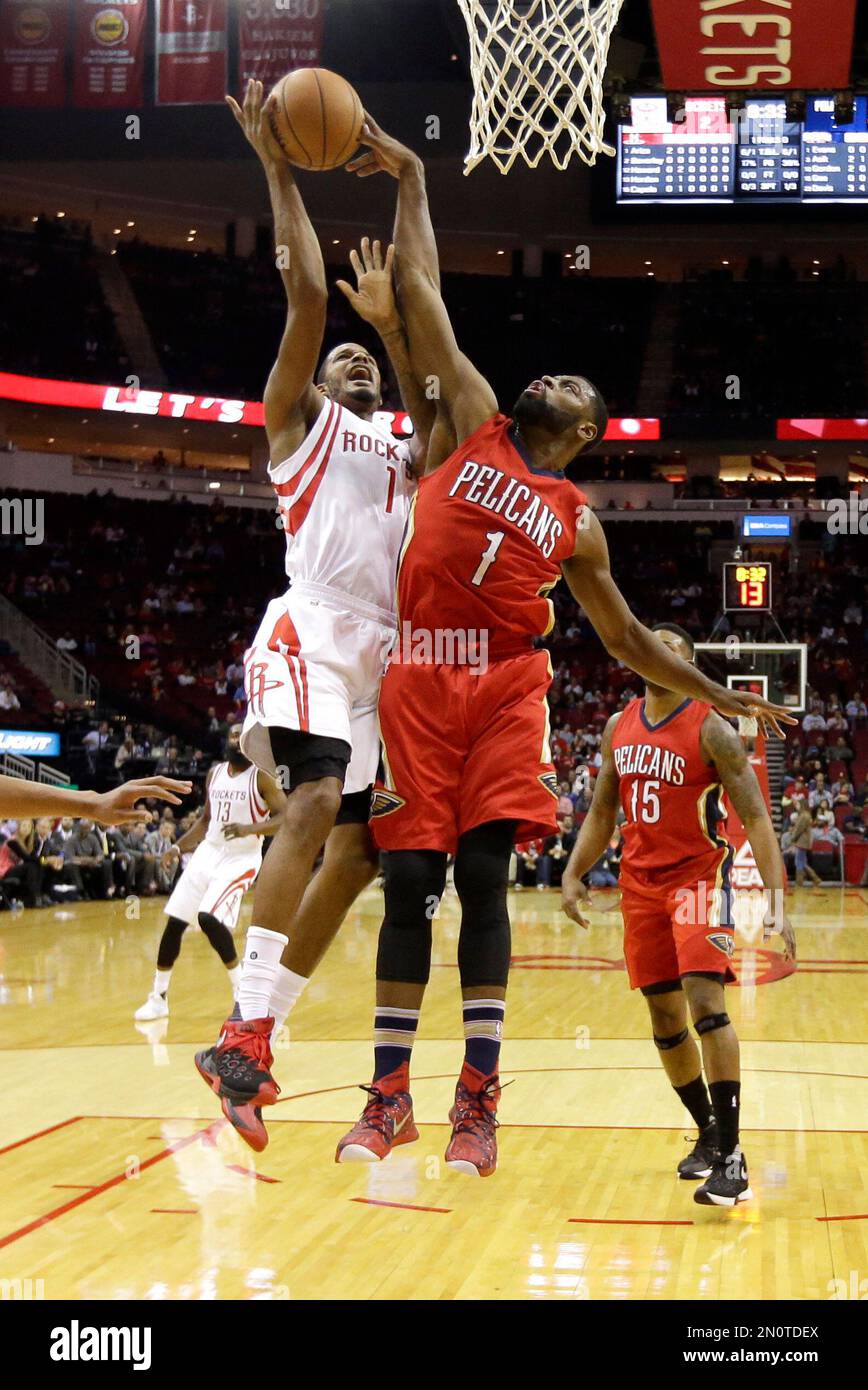 Houston Rockets' Trevor Ariza, left, has his shot blocked by New ...