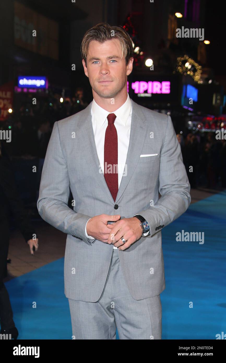 Chris Hemsworth poses for photographers upon arrival at the premiere of ...