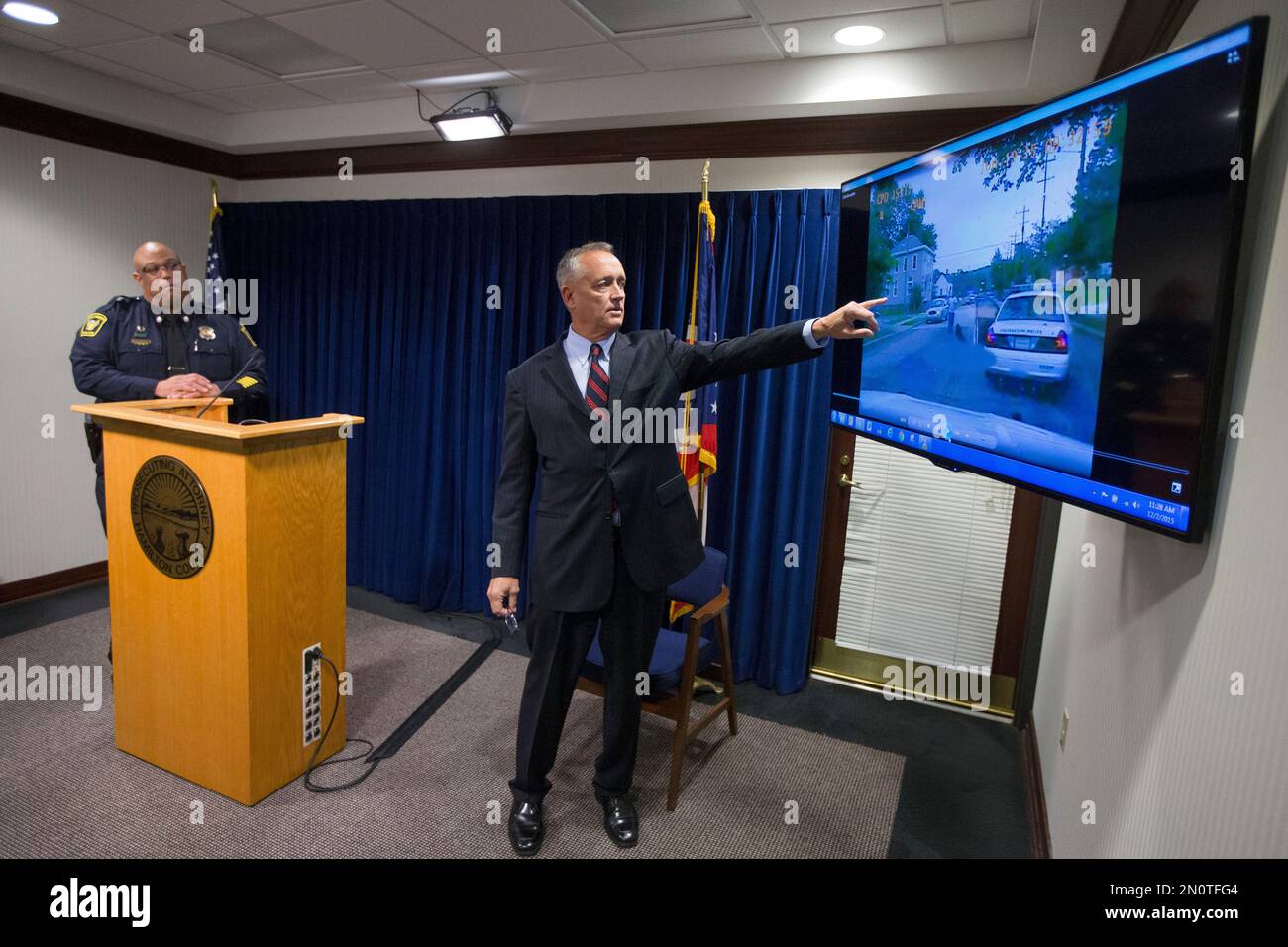 Hamilton County prosecutor Joe Deters, center, explains a dash cam ...