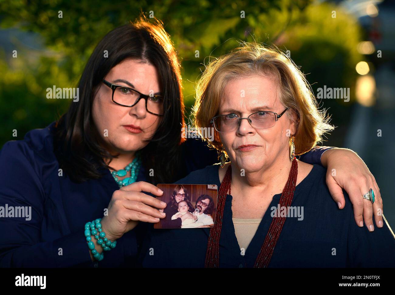 This June 18, 2015 photo shows Jennifer "Jenn" Carson, left, 40, and ...
