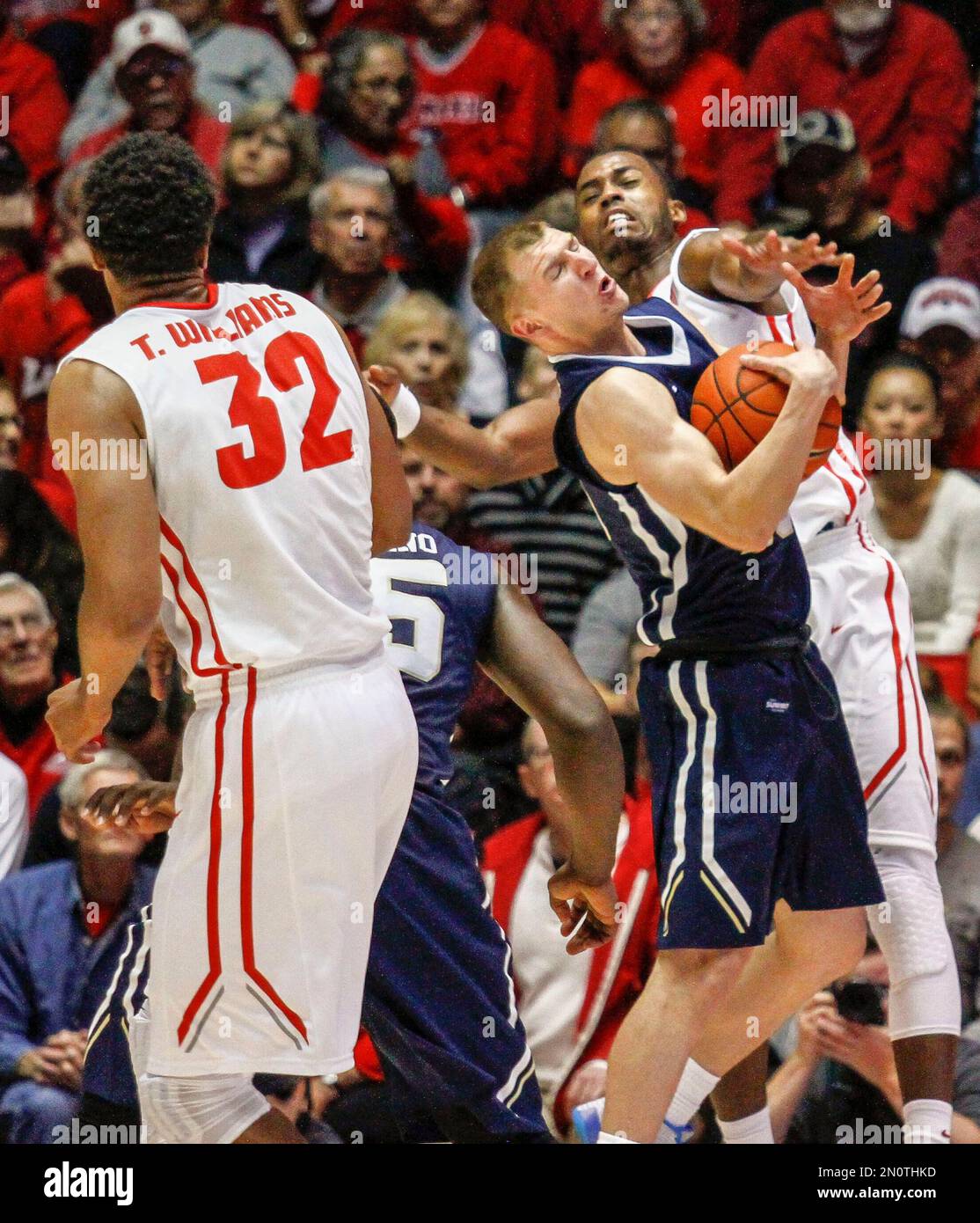Oral Roberts' Jalen Bradley (10) grabs a rebound over New Mexico's Sam ...