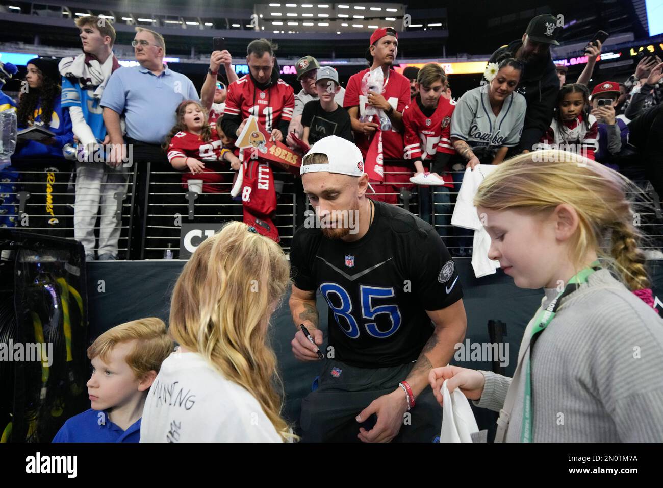 NFC tight end George Kittle (85) of the San Francisco 49ers signs ...