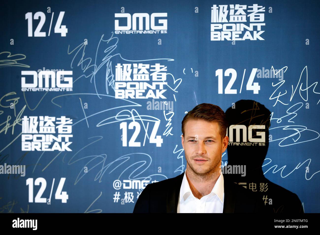 Australian actor Luke Bracey poses for photographers during a red ...