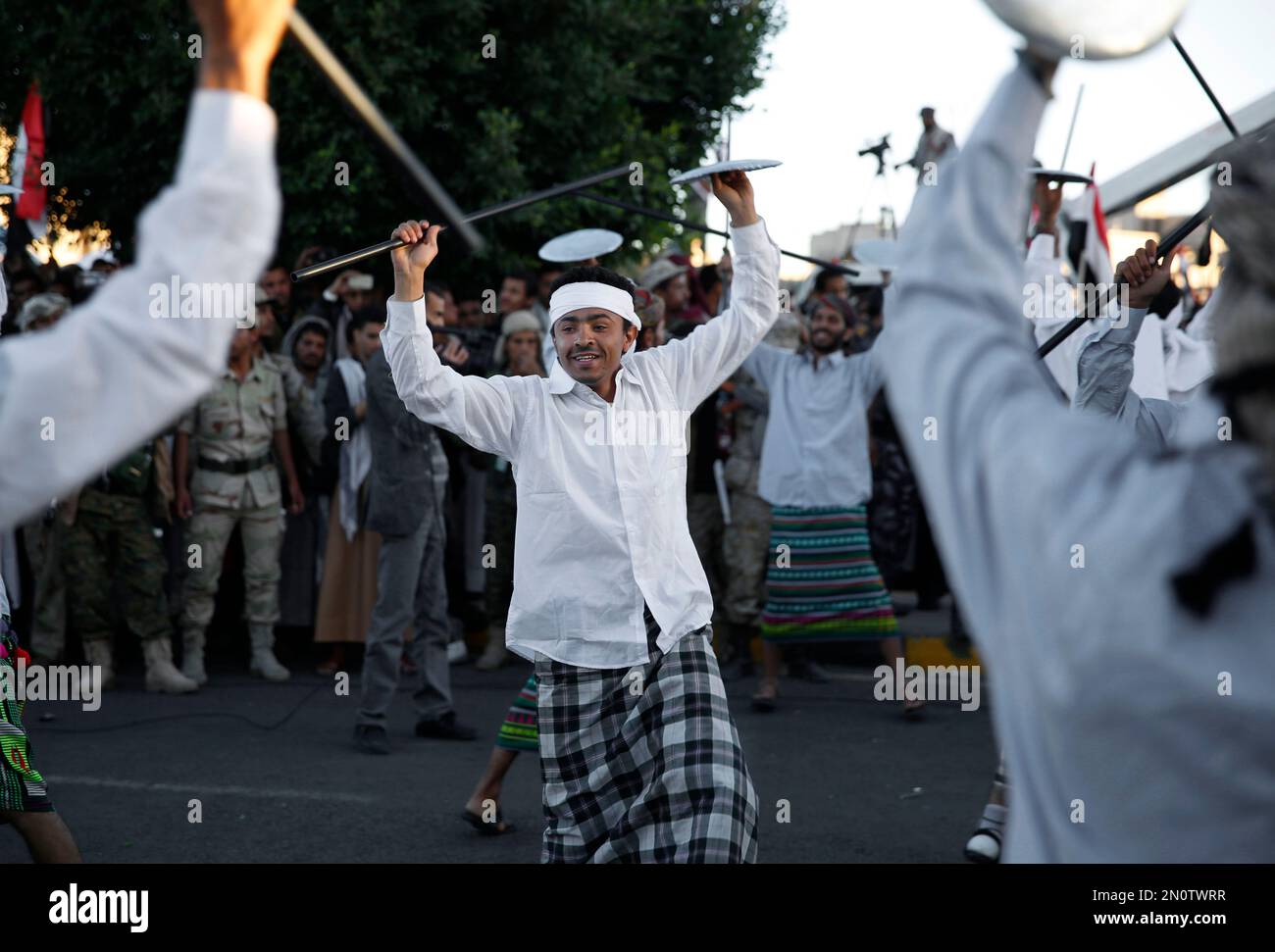 Shiite Yemenis, known as Houthis, perform a traditional dance during a ...