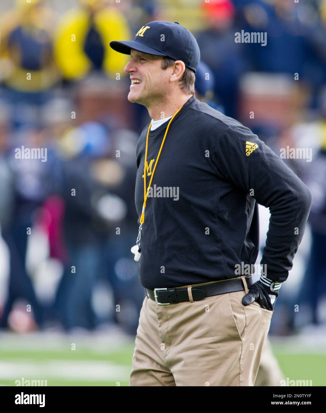 Michigan Head Coach Jim Harbaugh Walks The Michigan Stadium Field