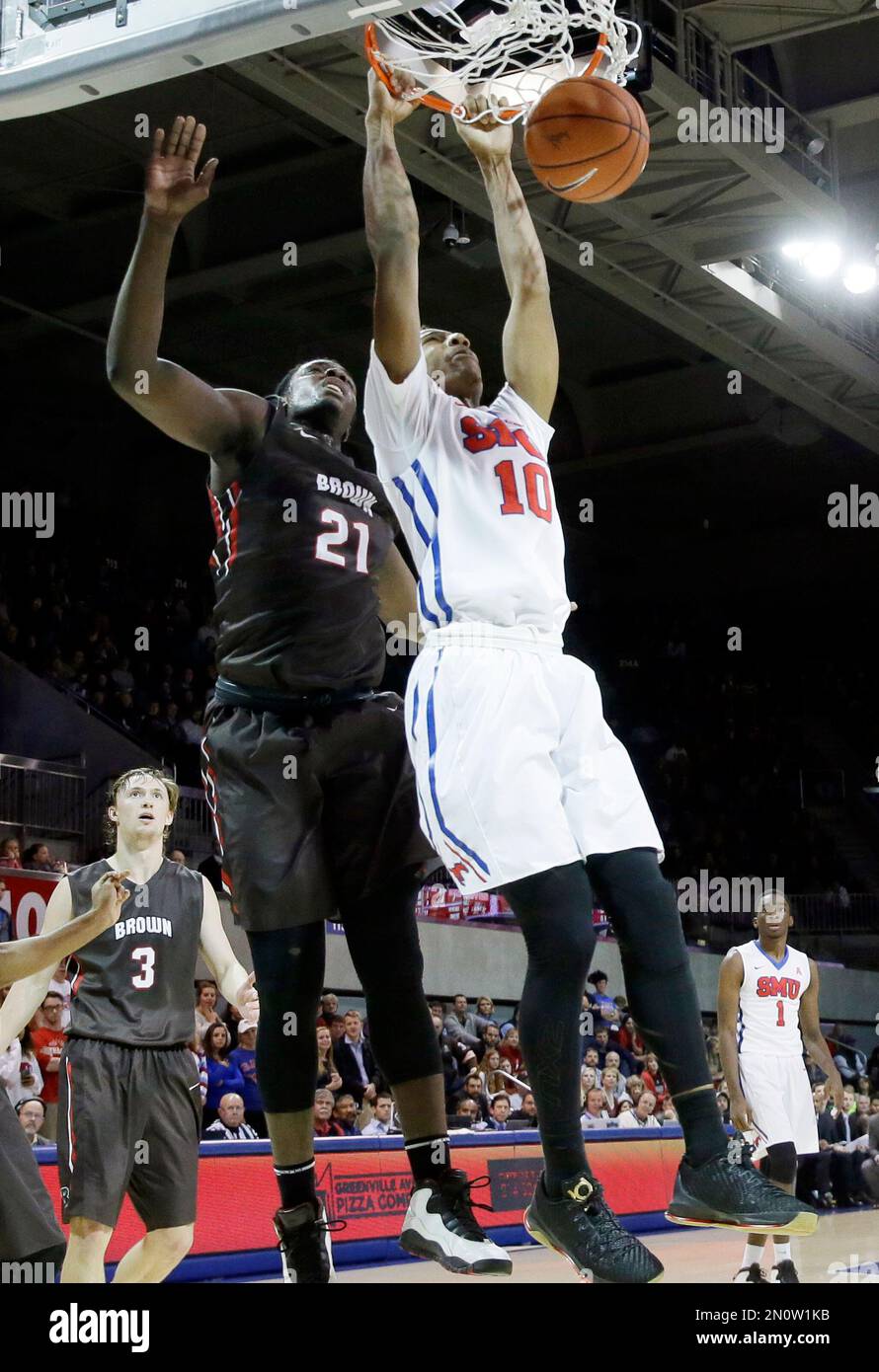 SMU guard Jarrey Foster (10) slam dunks against Brown's Cedric ...