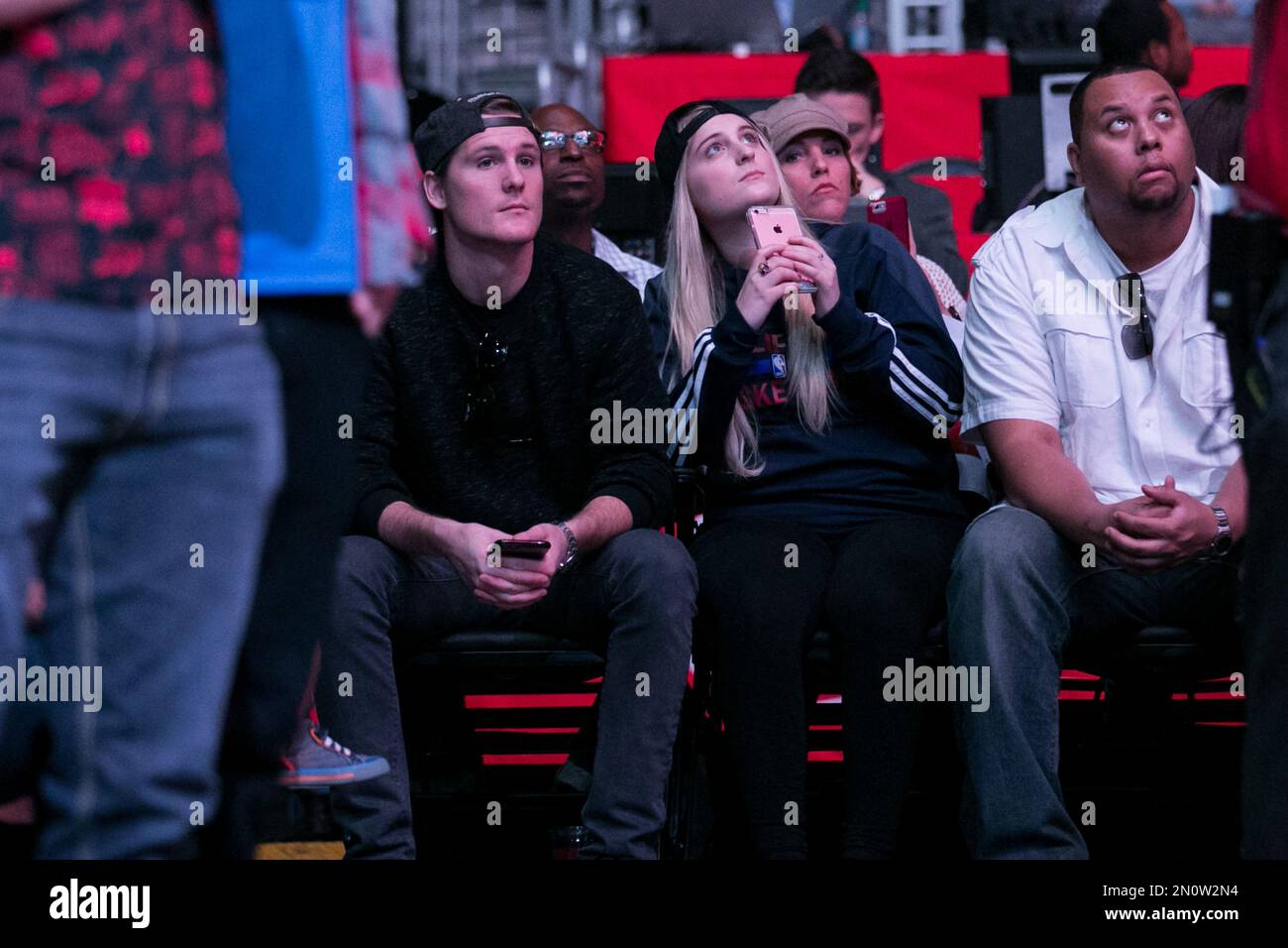 Meghan Trainor, right and brother Ryan Trainor attend the game between ...