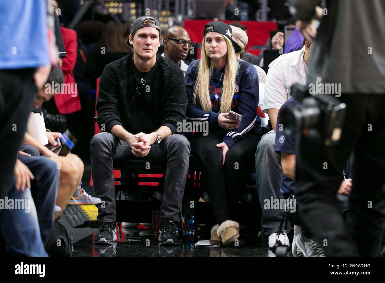Meghan Trainor, right and brother Ryan Trainor attend the game between ...