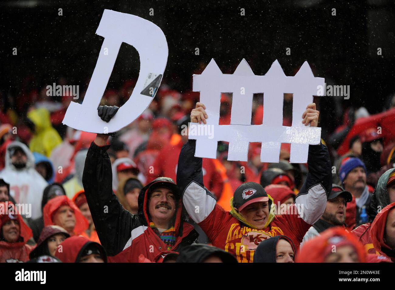 Kansas City Chiefs fans hold up signs to mean defense, during the first ...