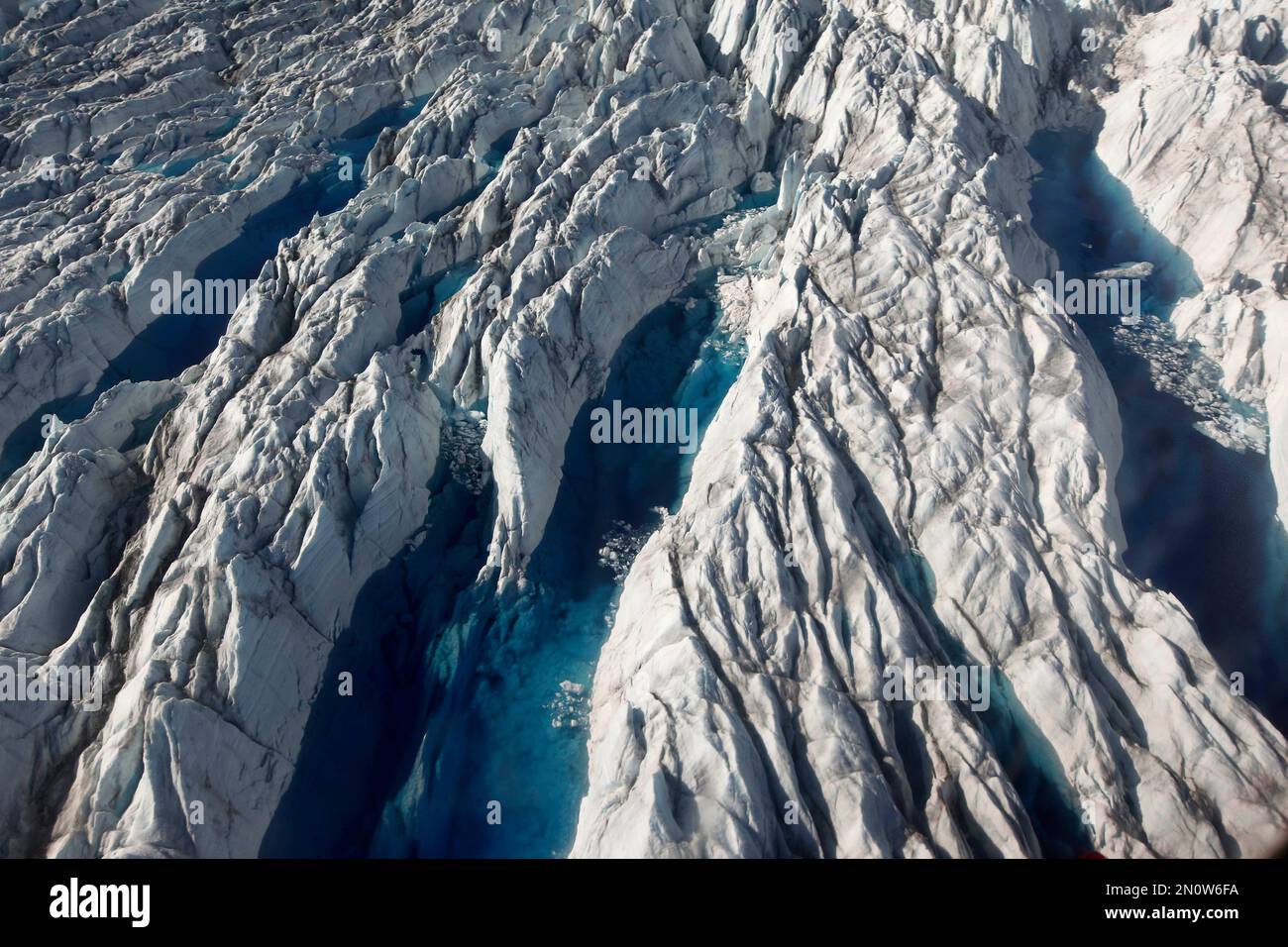 FILE - In this July 19, 2011 file photo, pools of melted ice form atop ...