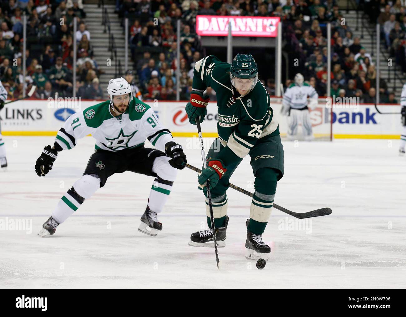 Minnesota Wild defenseman Jonas Brodin (25), of Sweden, controls the ...