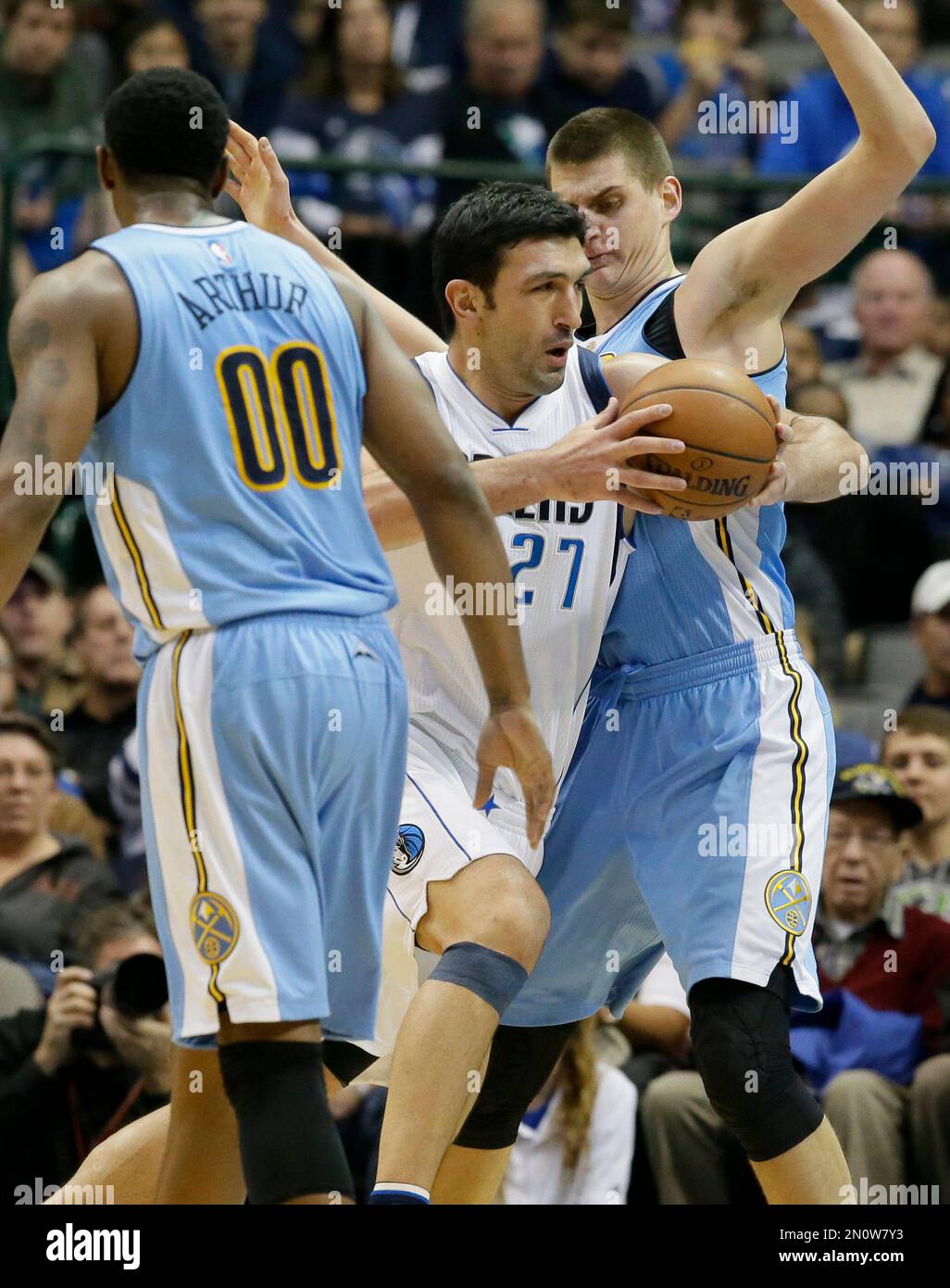 Dallas Mavericks center Zaza Pachulia (27) drives against Denver ...