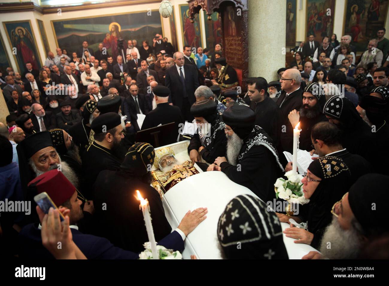 Clergy and faithful attend the funeral of Coptic Archbishop Abraham of ...
