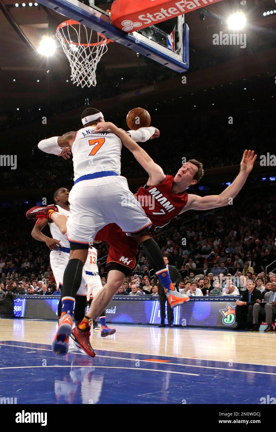 Miami Heat guard Goran Dragic, right, has his shot blocked by New York ...
